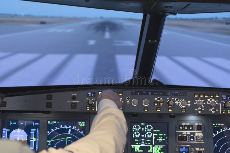 Front of the Cockpit of a Commercial Flight Simulator and View of an ...