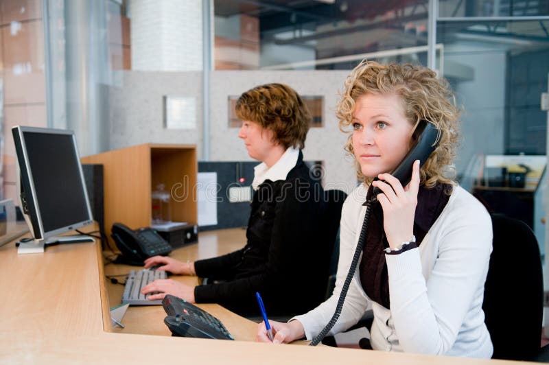 Front desk workers stock image. Image of contact, corporate - 9069347