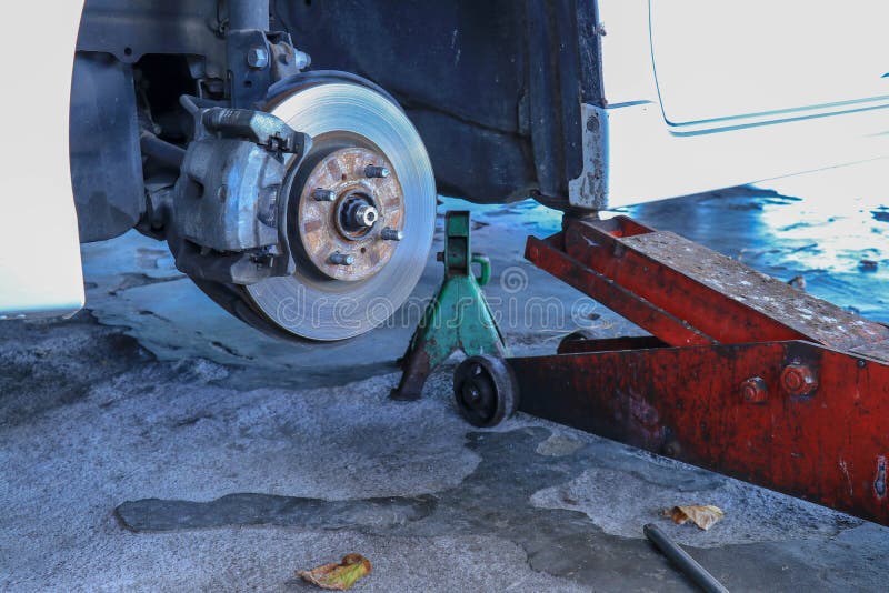 Front Disc Brake on Car in Process of New Tire Replacement Stock Photo ...