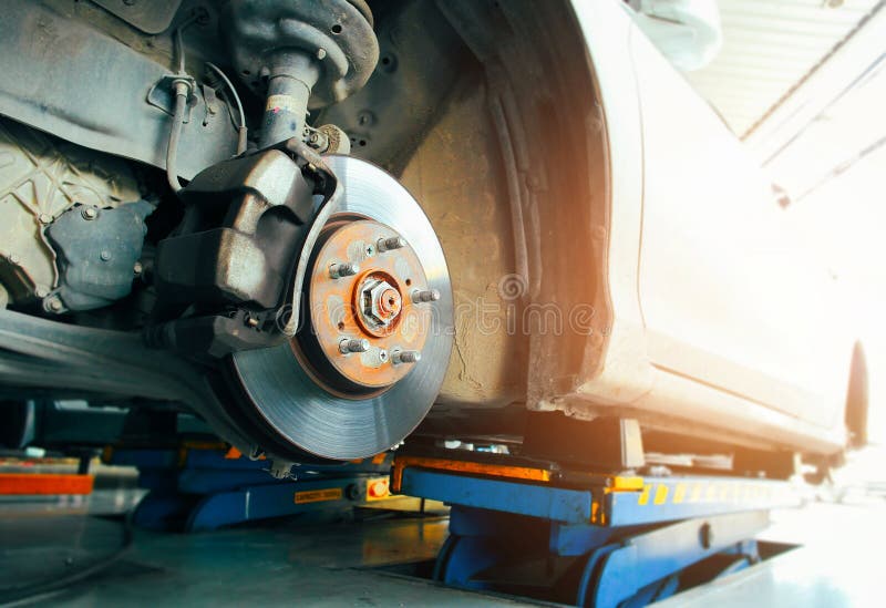 Front Disc Brakes and Calipers that Remove the Wheels of a Car in the ...