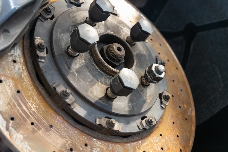 Front Disk Brake on Car in Process of Damaged Tyre Replacement. Stock ...