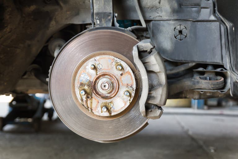 Front disk brake on car stock image. Image of axle, change - 29325285