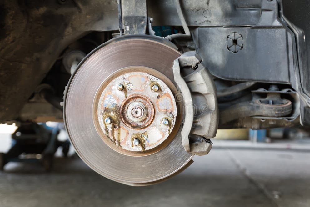 Front disk brake on car stock image. Image of axle, change - 29325285