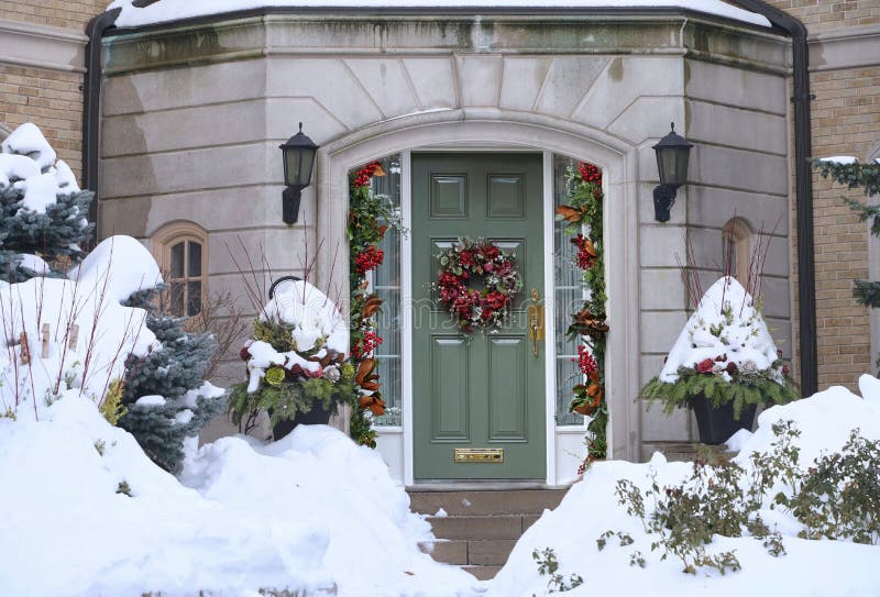 Front Door of House with Bushes Covered in Snow Stock Image - Image of ...