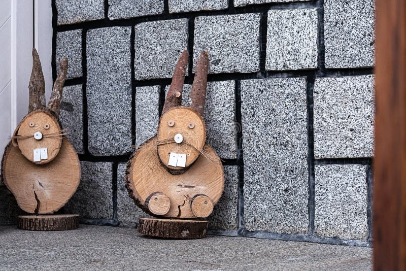 At the Front Door of the House There are Two Wooden Rabbits. Stock ...