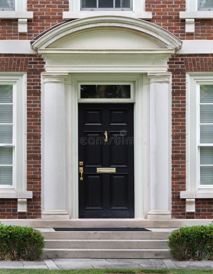 Front Door with Stone Frame Stock Image - Image of large, suburb: 122323375
