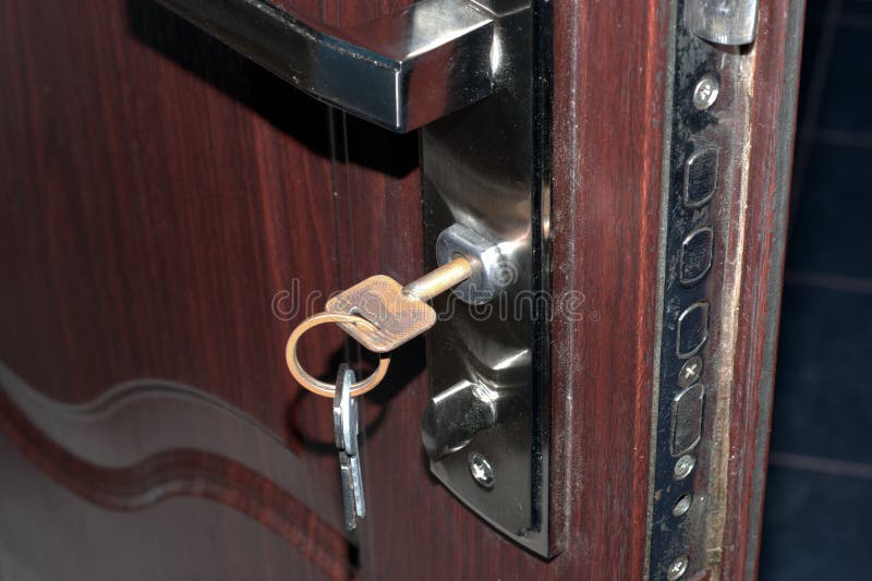 Front Door To the House with the Key in the Lock Stock Image - Image of ...