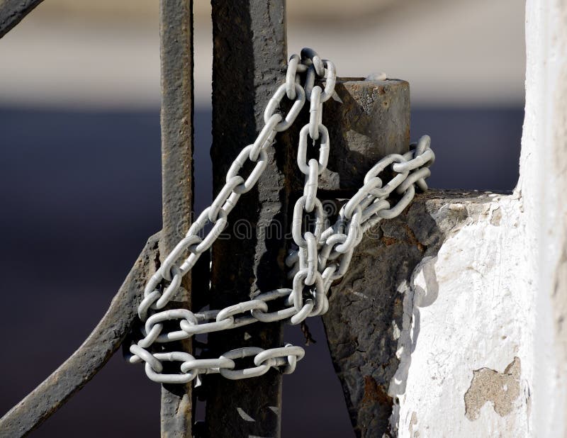 The Front Door is Wrapped in a Chain. Stock Image - Image of security ...