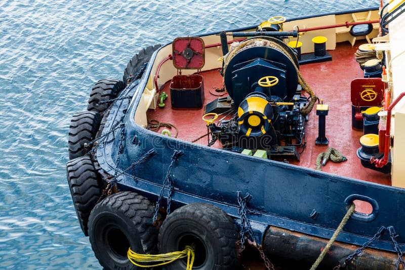 Large Tugboat by Cruise Ship Stock Image - Image of vacation, europe ...
