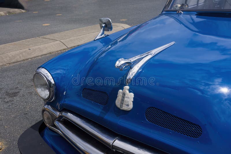 Front End and Hood Ornament of a Vintage Blue Car. Editorial Stock ...