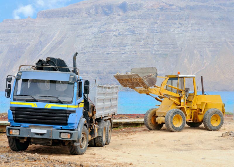 Front End Loader and Dumper; Graciosa, Spain Stock Photo - Image of ...