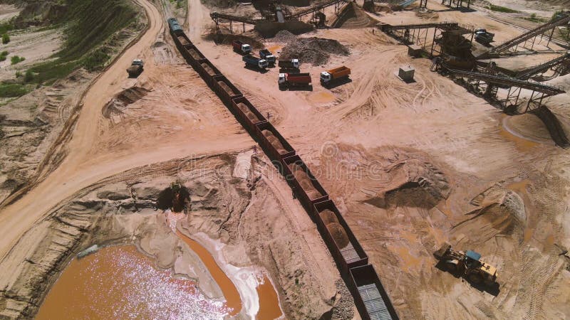 Front End Loader Load Sand and Gravel in Dump Truck in Open Pit. Stock ...