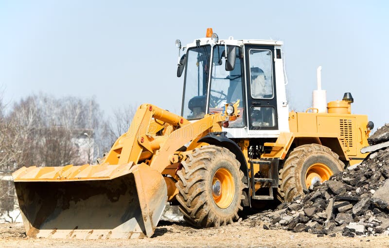 Front end loader machine stock image. Image of building - 17126881
