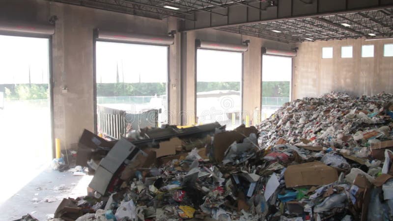 A Pile of Cardboard Trash in Front of a Garage. Recycling Concept Stock ...
