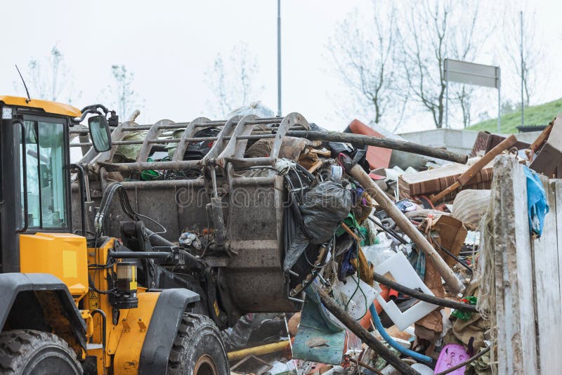 Front End Loader Moving Along Recycling Center Area, Close Up View ...