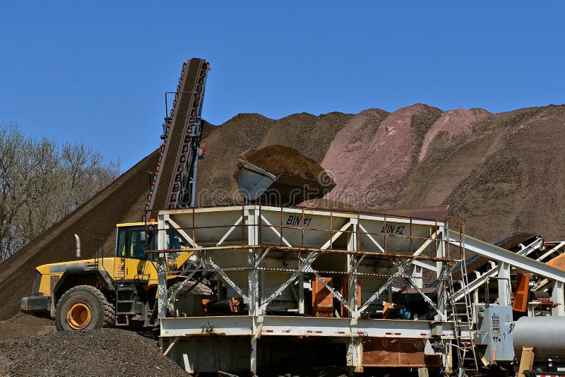 Front End Loader Moving a Scoop of Sand Stock Photo - Image of ...