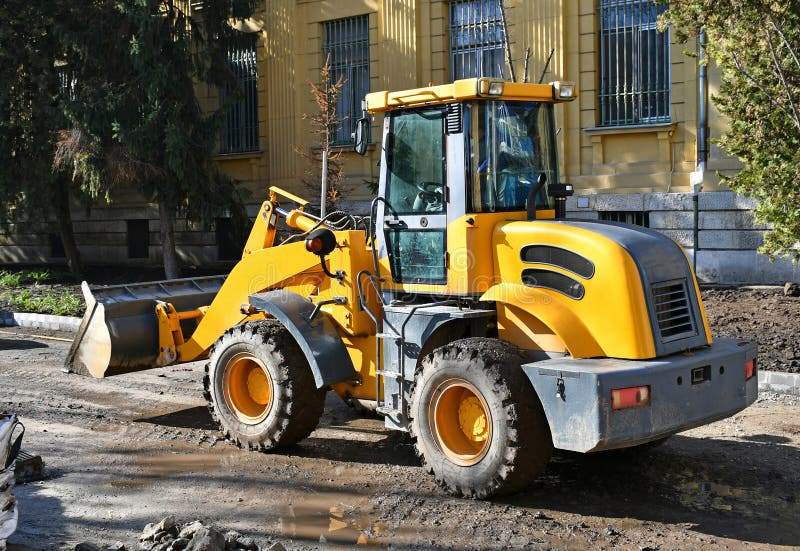 Front End Loader at the Road Construction Stock Photo - Image of ...