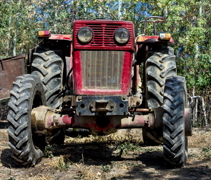 Front of a farm tractor stock photo. Image of dirty, field - 26773650