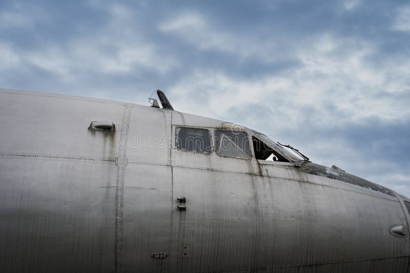 The Front Fuselage of an Old an 12 Military Cargo Aircraft Stock Photo ...