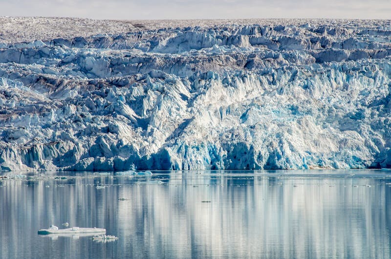 Front of a Glacier with Flat Sea Stock Photo - Image of reflected ...