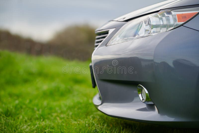 Front of the Grey Car on the Grass Stock Photo - Image of machine ...