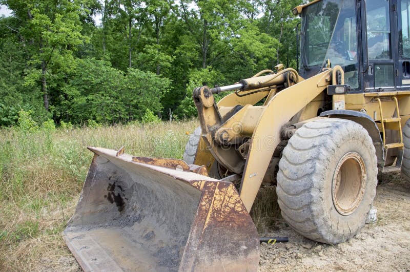 Front End Loader at a Job Site Stock Image - Image of excavation, arms ...