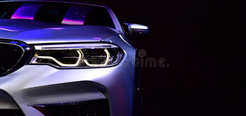 Front Headlights of Gray Modern Car on Black Background Stock Photo ...