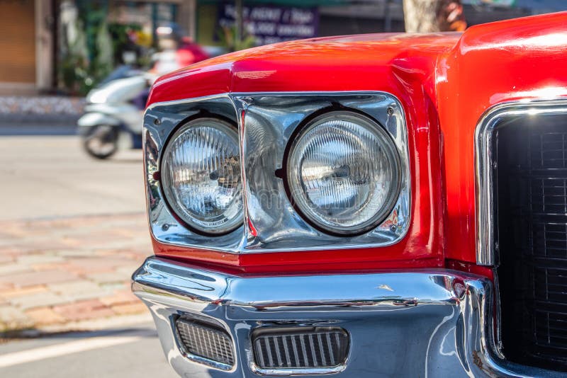 The Front Headlights of a Red Classic Car or Muscle- Car Editorial ...