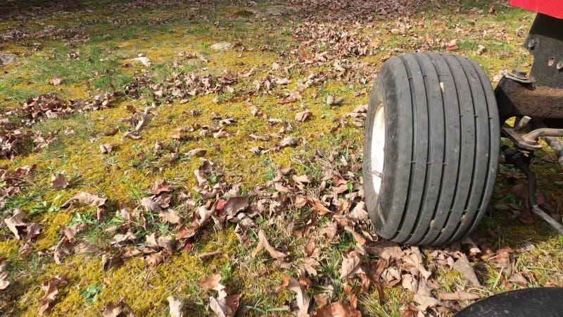 Front Left Tire of a Riding Lawn Mower Stock Video - Video of wheel ...