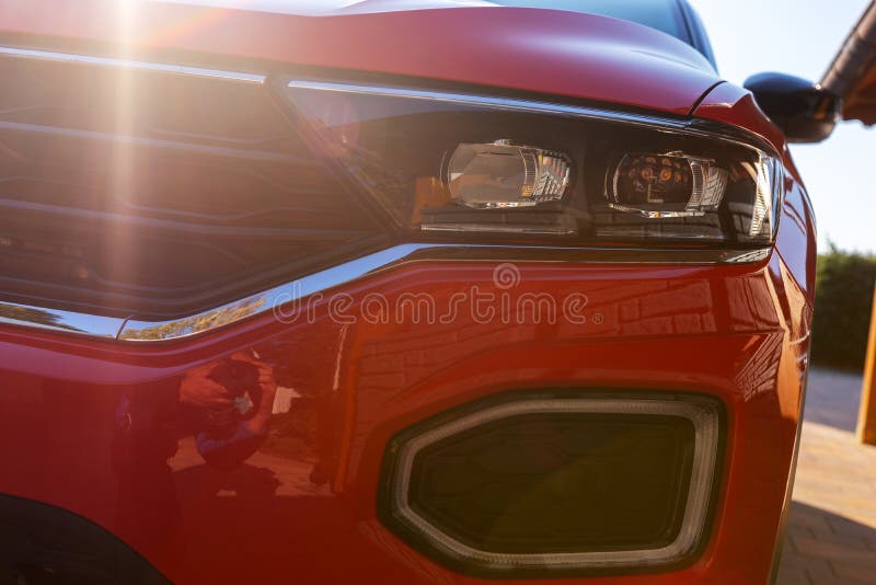 Front Light of a New Red Car Stock Image - Image of detail, style ...