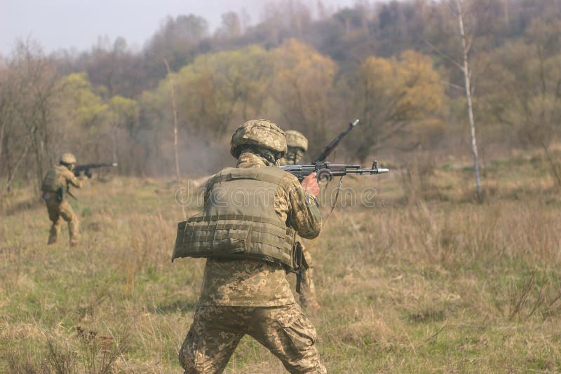 Front Line. Military Attack on Battlefield from Ambush Stock Photo ...