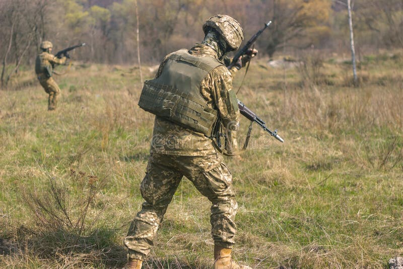 Front Line. Military Attack on Battlefield from Ambush Stock Photo ...