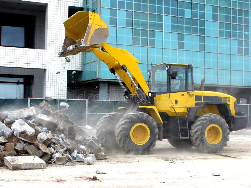 Front Loader Dumping Debris on Construction Site Stock Image - Image of ...