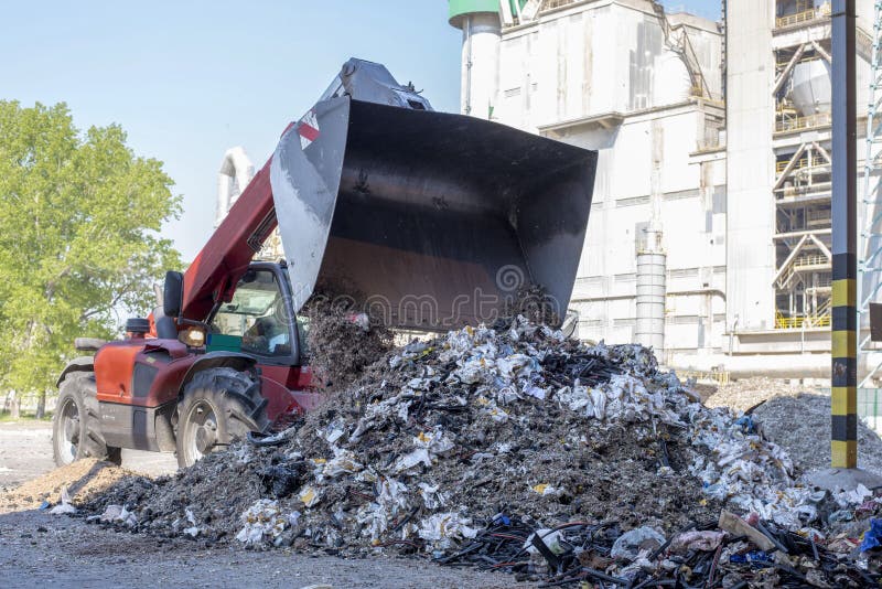 Front Loader Transporting Industrial and Communal Waste Materials in ...
