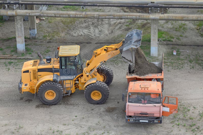 Front Loader Loads Gravel Mixture into a Dump Truck Editorial Stock ...
