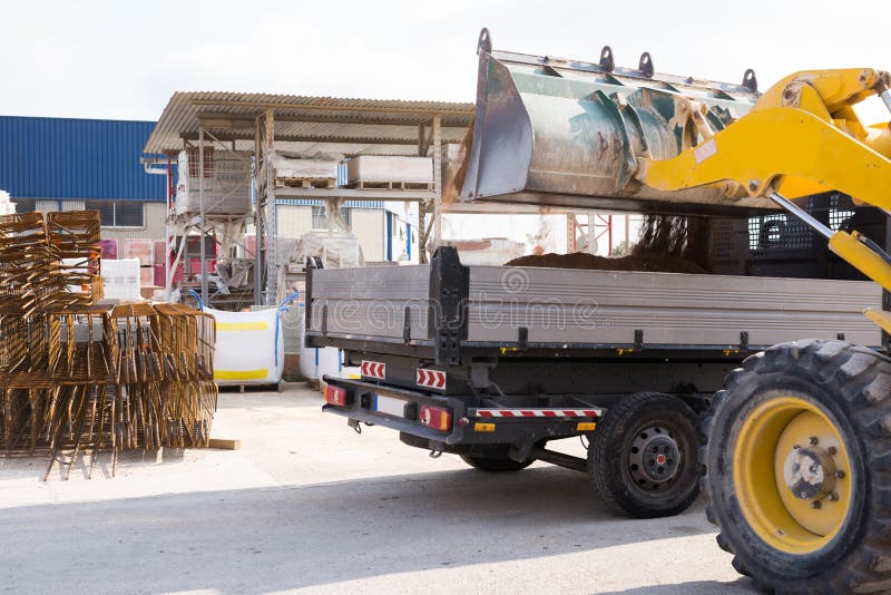 Front Loader Loads Sand into the Back of Truck Stock Photo - Image of ...