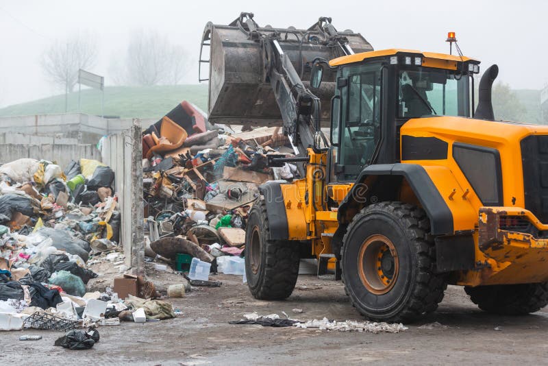 Front End Loader Moving Along Recycling Center Area, Close Up View ...