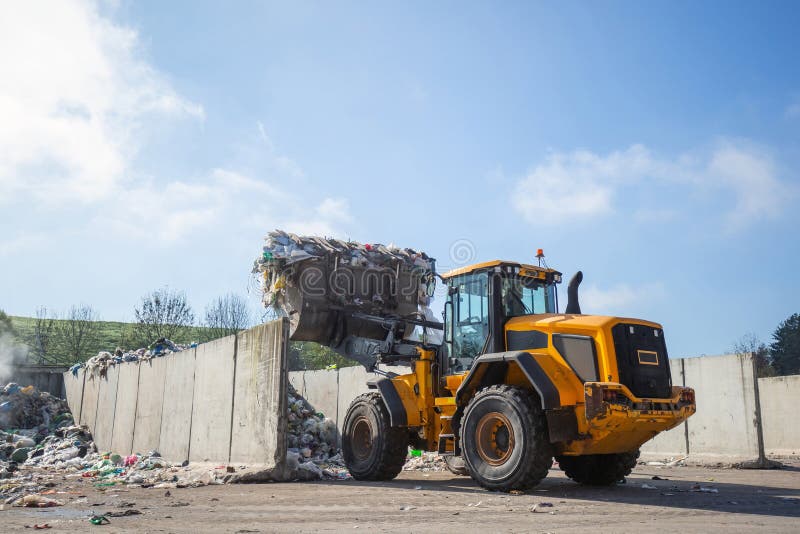 Front End Loader Moving Along Recycling Center Area, Close Up View ...