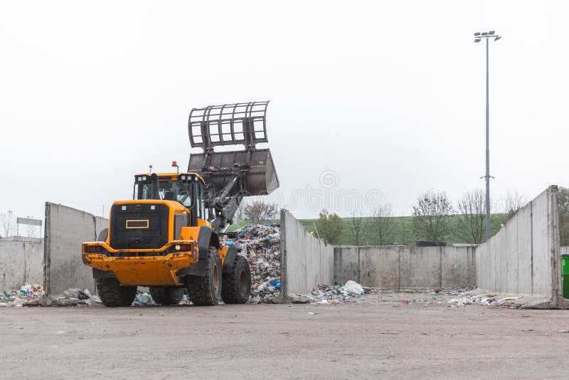 Front End Loader Moving Along Recycling Center Area, Close Up View ...
