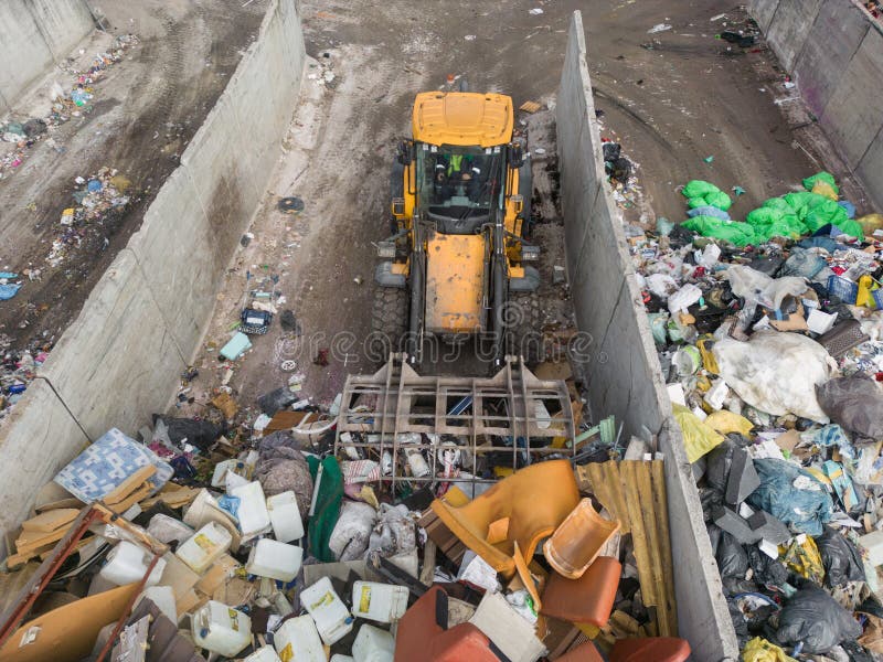 Front Loader Moving Forward and Backward at a Recycling Center Stock ...