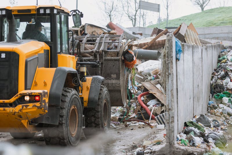 Front End Loader Moving Along Recycling Center Area, Close Up View ...