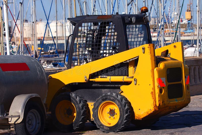 Front loader stock image. Image of trencher, skid, hydraulic - 75049611