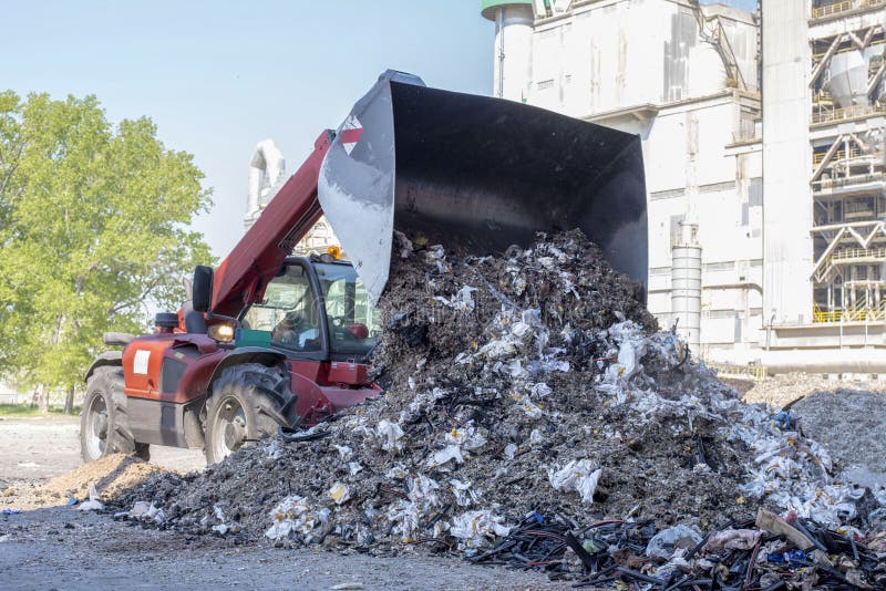 Front Loader Transporting Industrial and Communal Waste Materials in ...