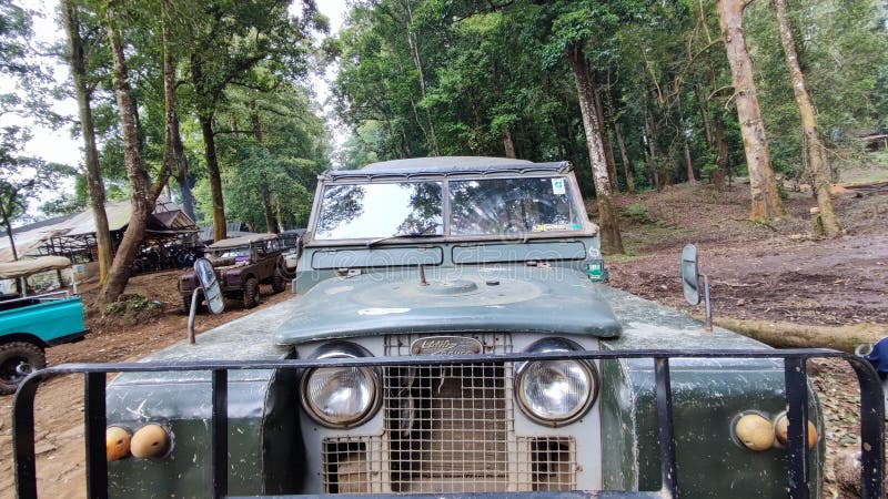 The Front Look of a Land Rover in the Middle of a Forest Editorial ...