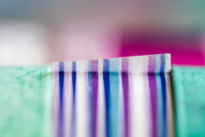 A Front Macro Portrait of a Role of Washi Tape with a Striped Pattern ...