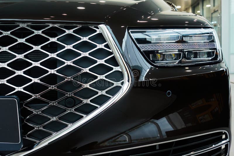 The Front of a Modern Car with a Headlight and Grille. Auto Front View ...