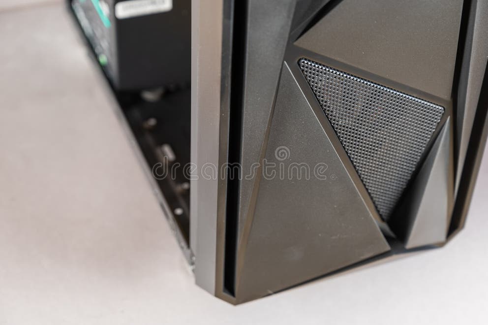The Front of a Modern Desktop Computer. Black System Unit in a ...