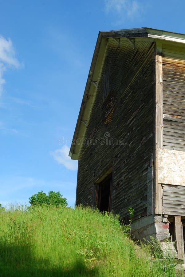 Front of Old Wood Barn Reaching Up into a Blue Summer Sky Stock Photo ...