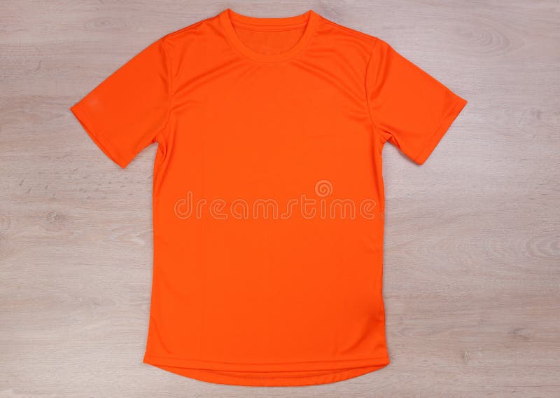 Front Orange Running Tshirt on Wooden Background Stock Image - Image of ...