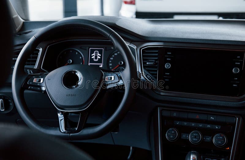 Front Panel of Luxury New Car in the Automobile Salon. Black Interior ...